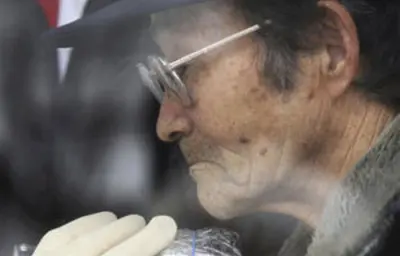 Workers abandon Japan plant after radiation surge