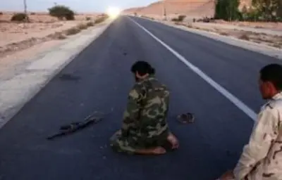 Pro-Gaddafi snipers stall attack on hometown