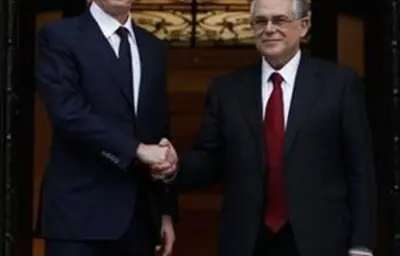 Papademos sworn in to lead party-packed Greek Cabinet