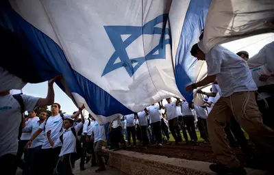 Israel under pressure to reverse settlement plans